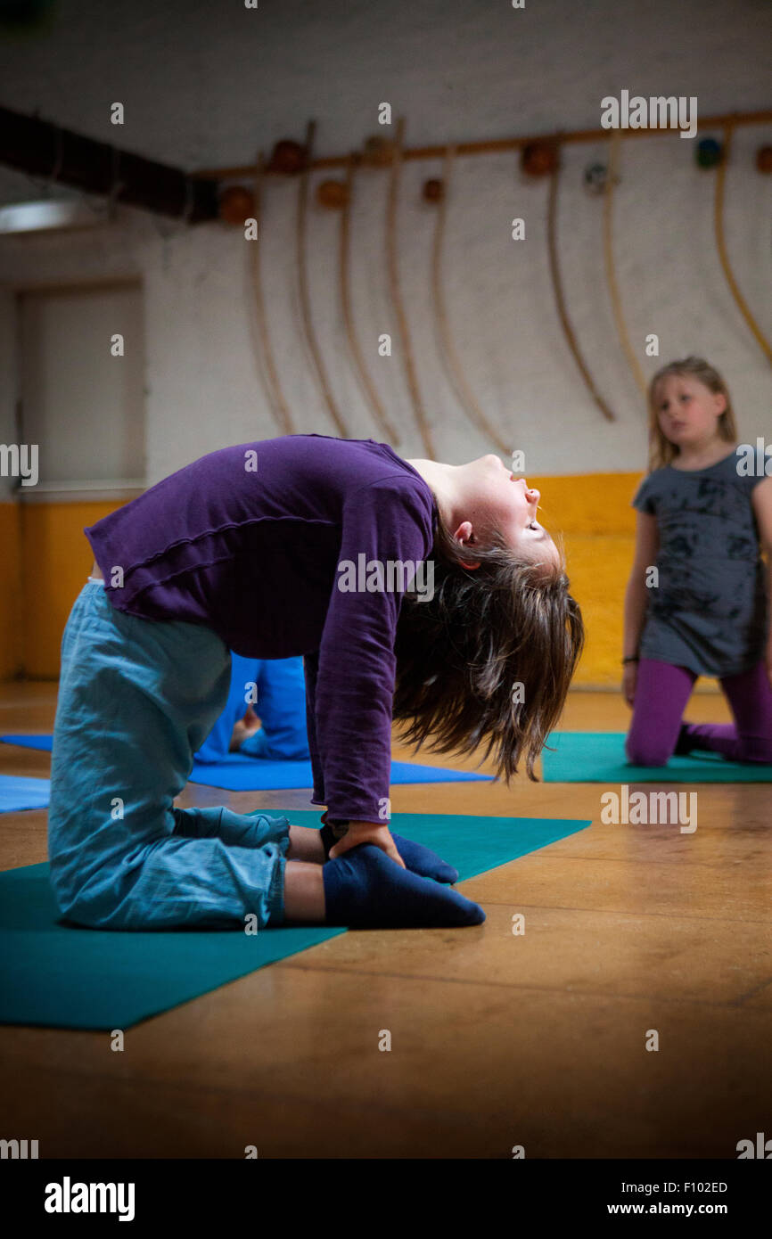 CHILD PRACTICING YOGA Stock Photo - Alamy
