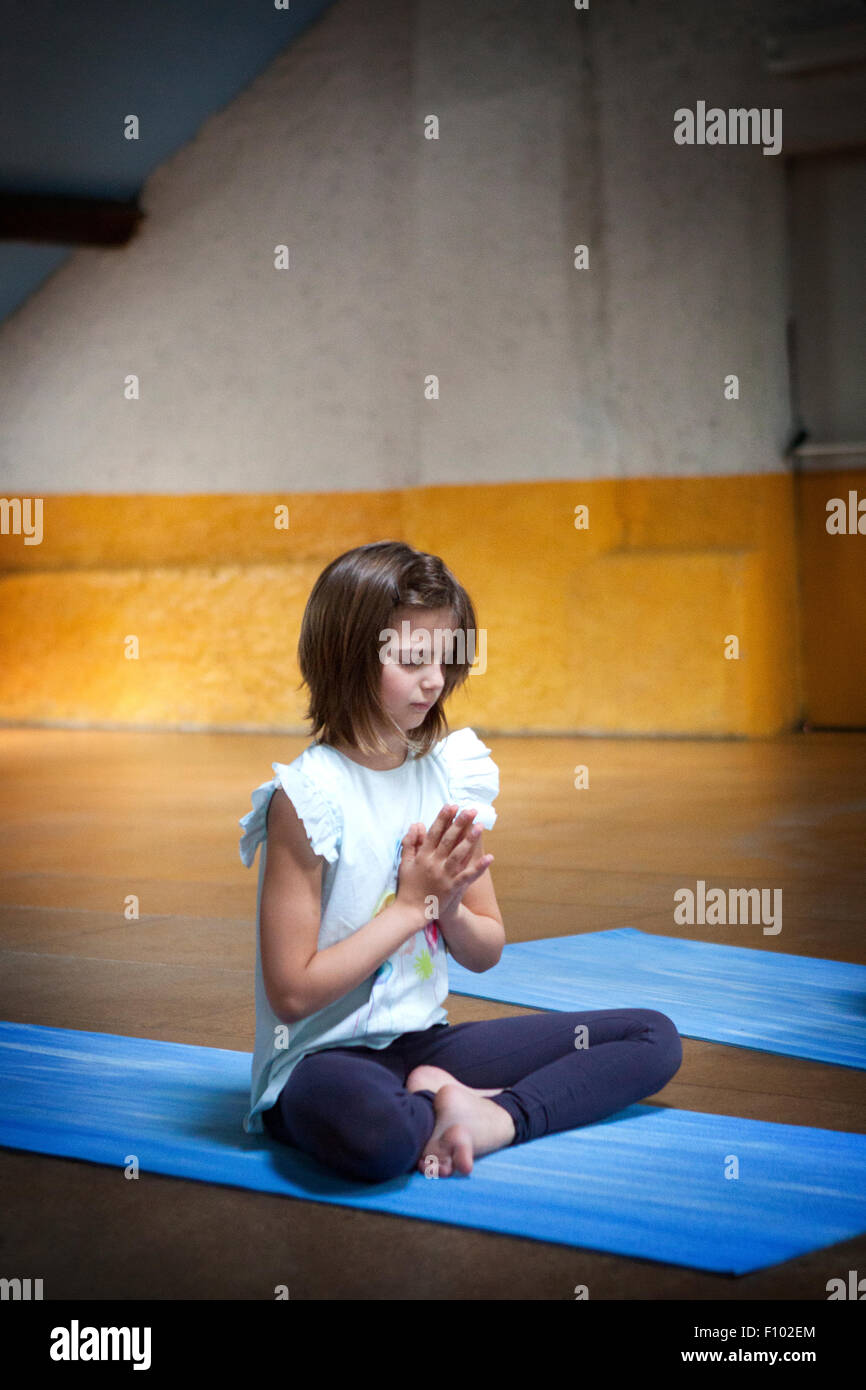CHILD PRACTICING YOGA Stock Photo - Alamy