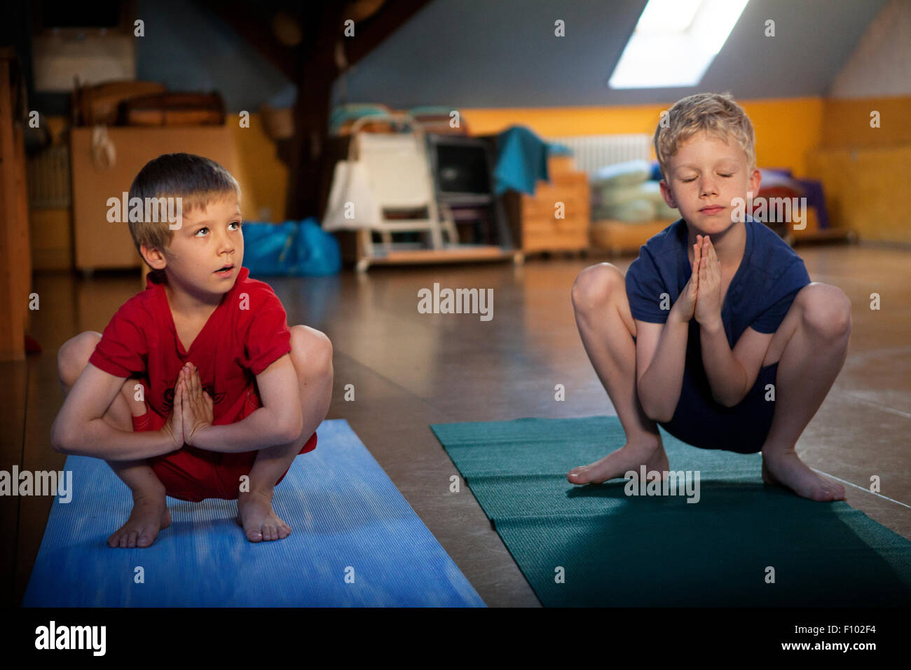 CHILD PRACTICING YOGA Stock Photo - Alamy