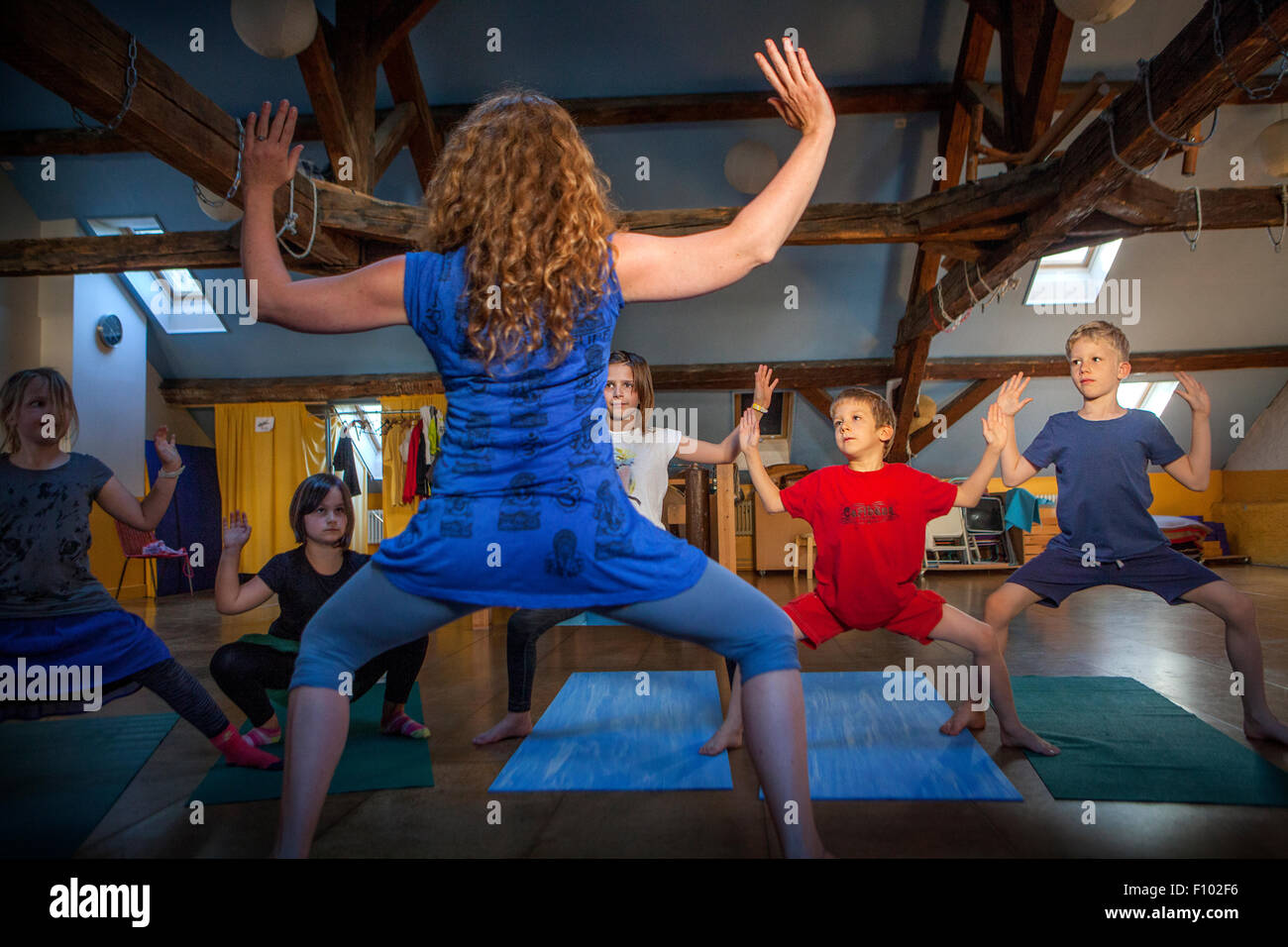 CHILD PRACTICING YOGA Stock Photo - Alamy