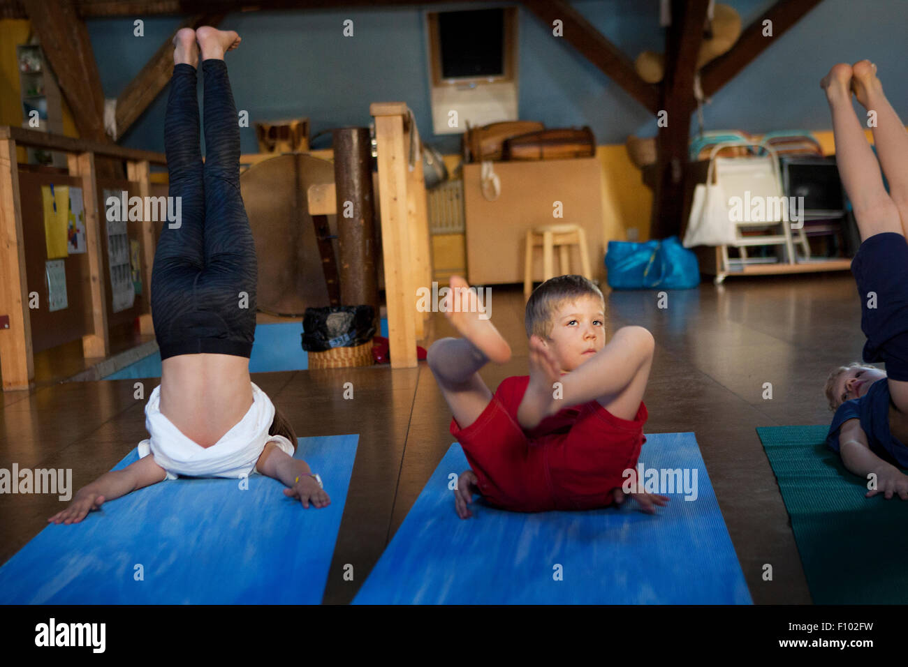 CHILD PRACTICING YOGA Stock Photo - Alamy