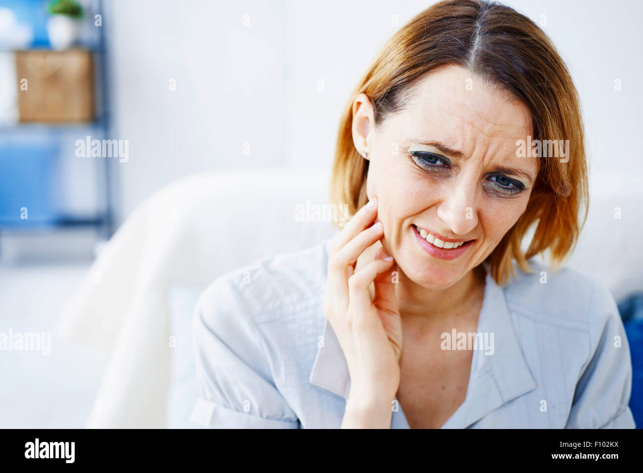 WOMAN WITH A TOOTHACHE Stock Photo - Alamy