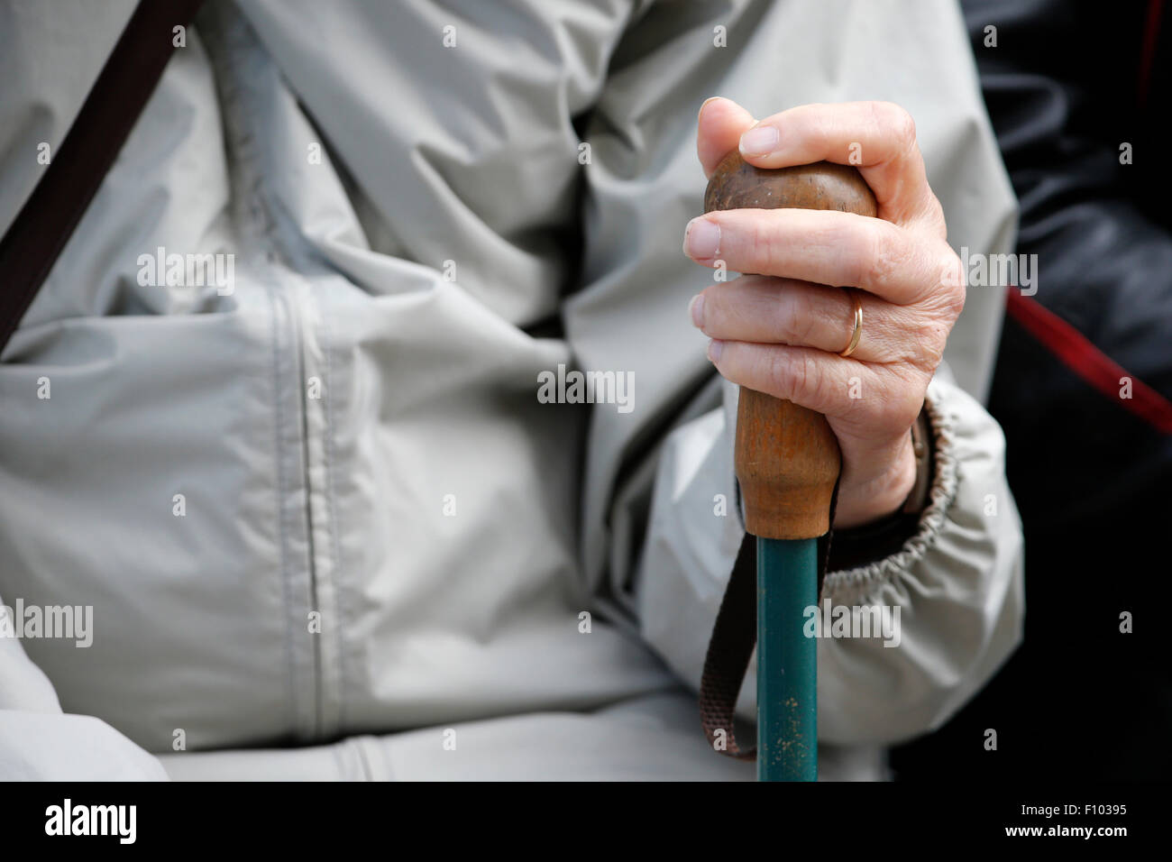 SENIOR OUTDOORS WITH CANE Stock Photo - Alamy
