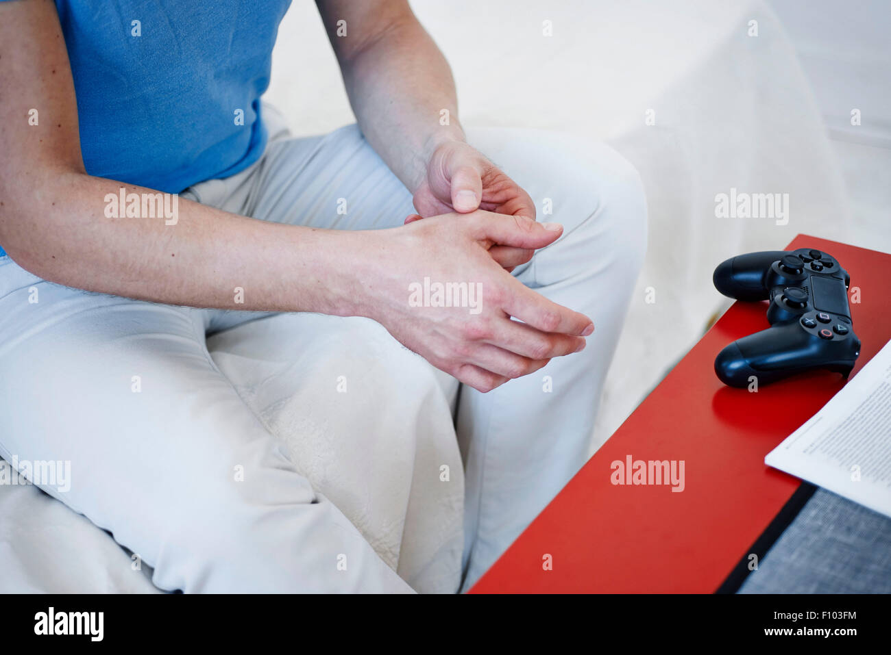 Gamepad male hands close hi-res stock photography and images - Alamy