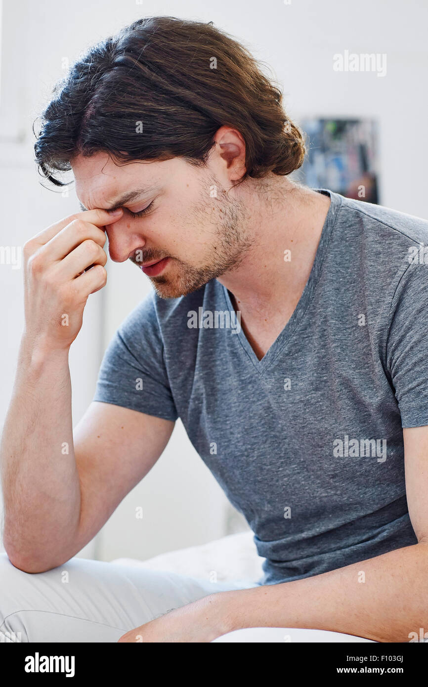 Man nose headache pain hi-res stock photography and images - Alamy