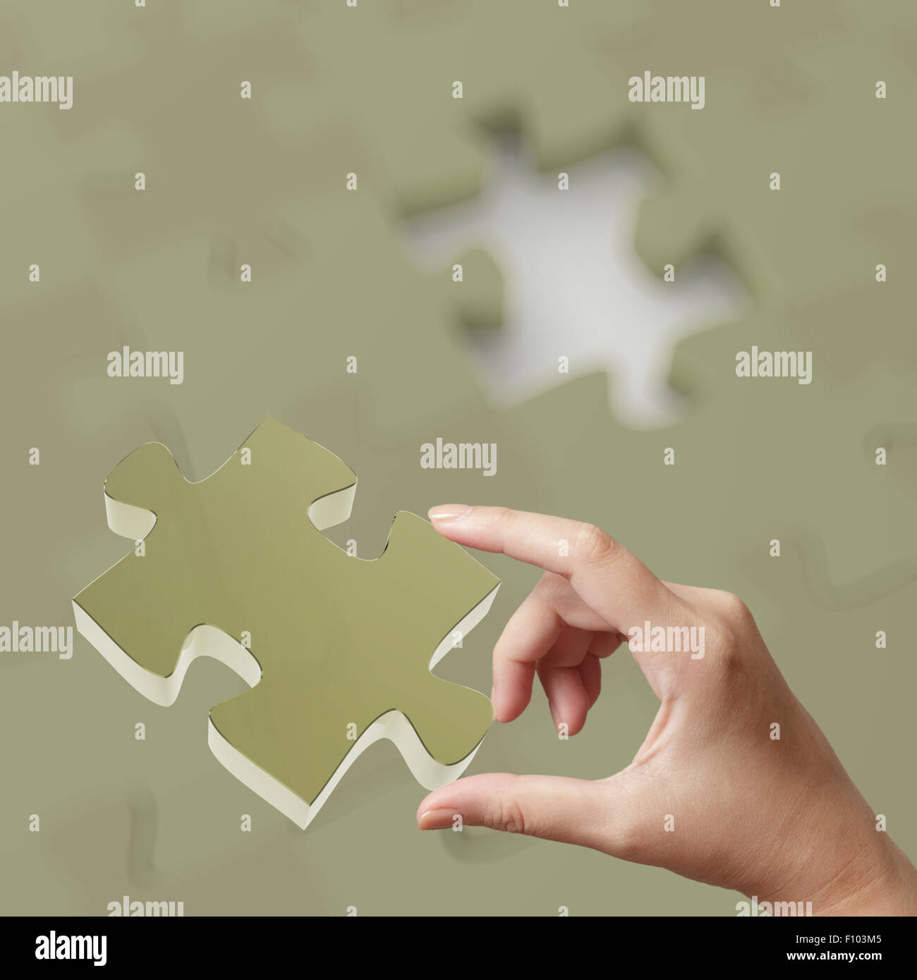 Closeup hand placing final puzzle hi-res stock photography and images ...