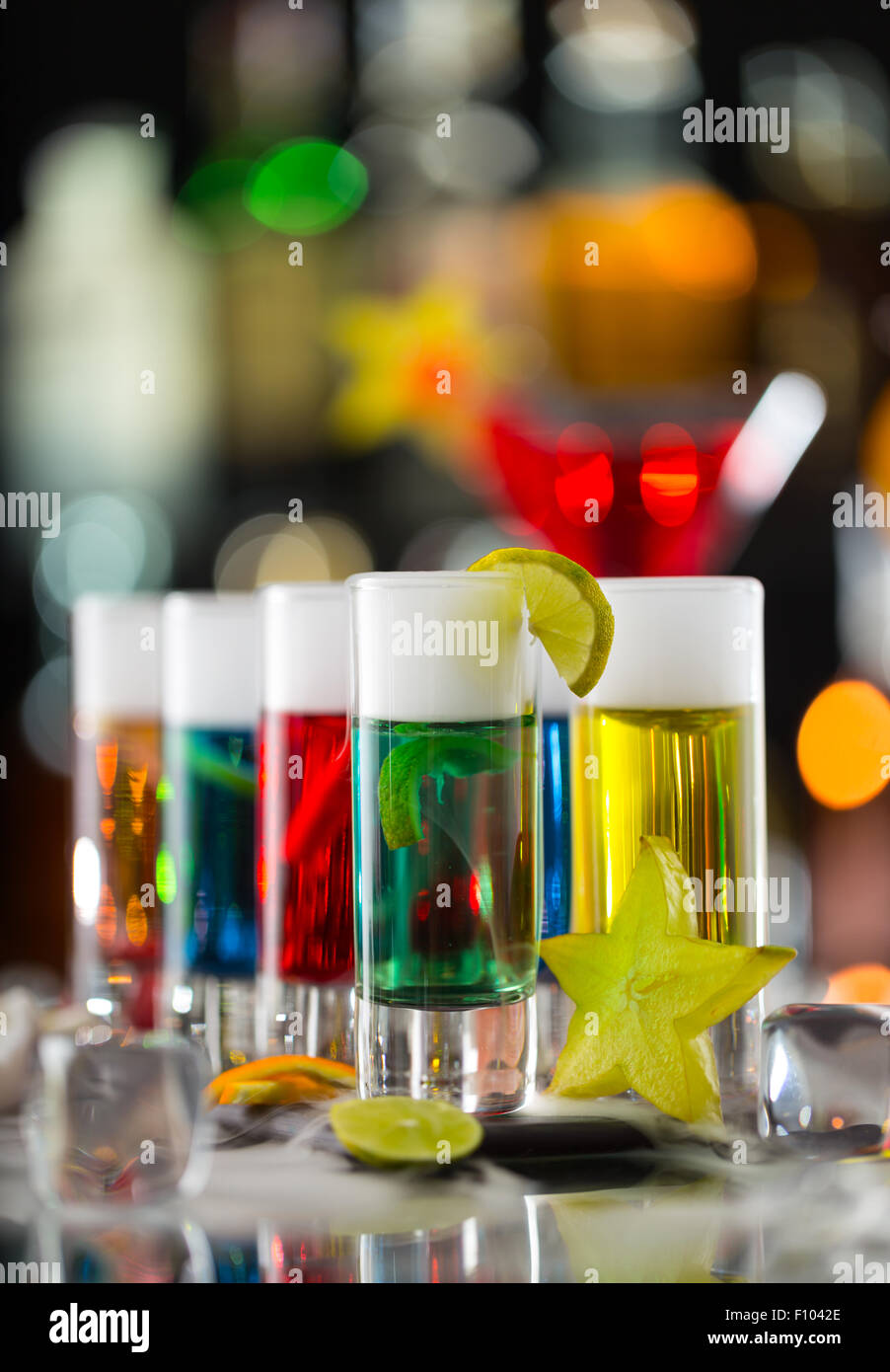 Colored alcoholic shots on bar counter Stock Photo - Alamy