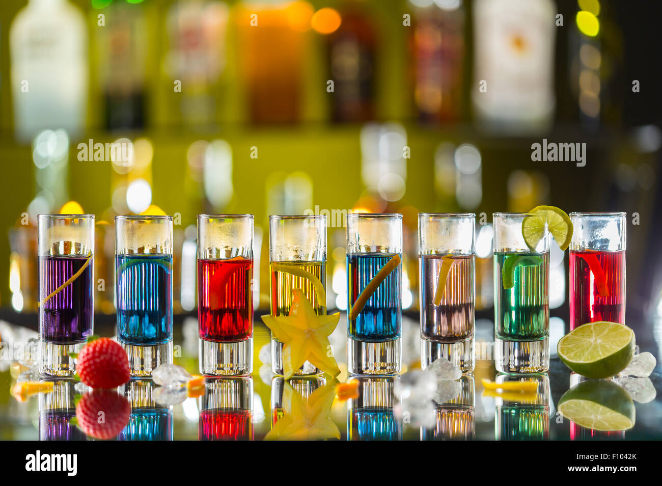 Colored alcoholic shots on bar counter Stock Photo - Alamy