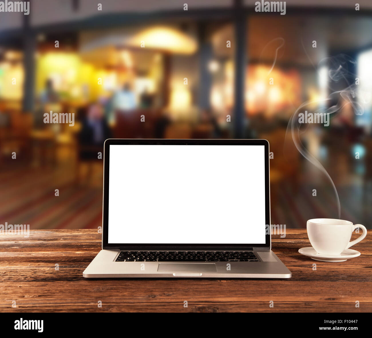 Laptop in coffee shop Stock Photo - Alamy