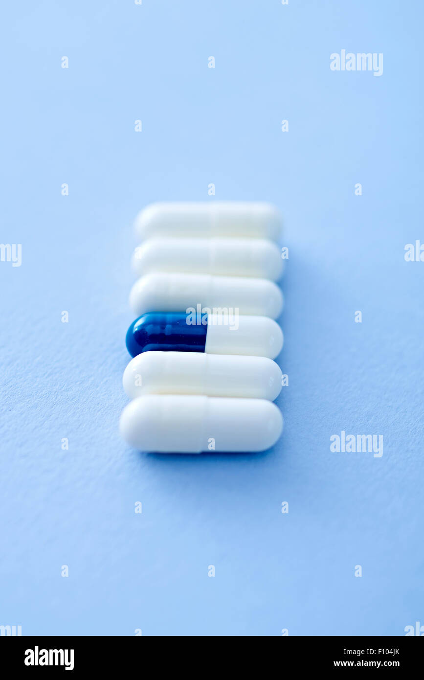 White and blue medicine caps hi-res stock photography and images - Alamy