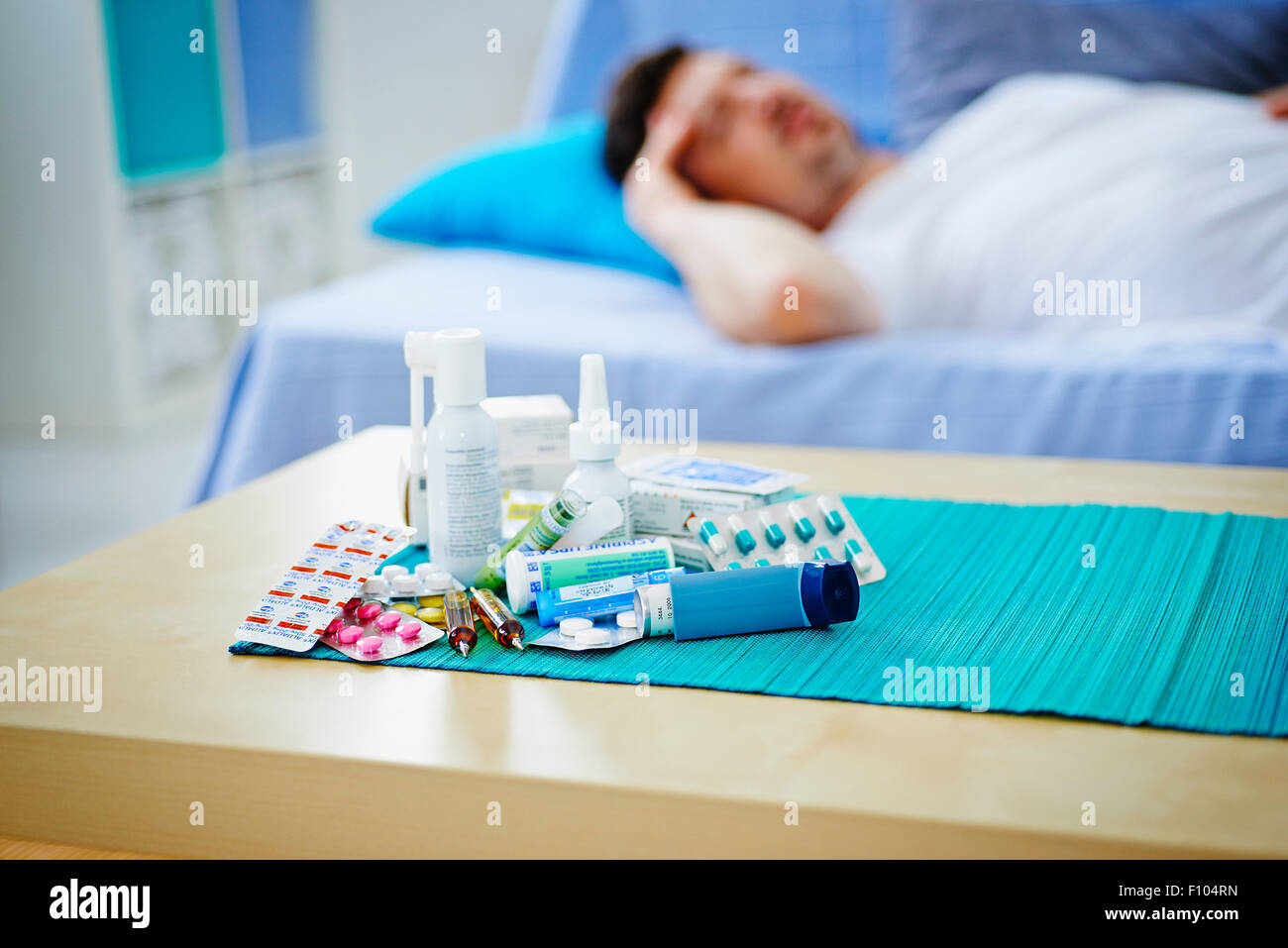 Sick old man laying hi-res stock photography and images - Alamy