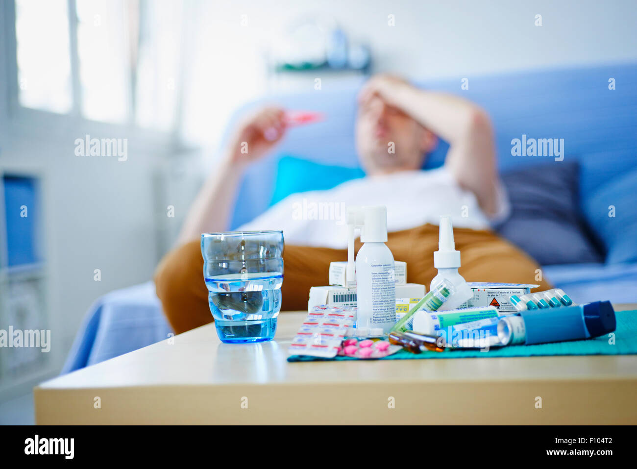 Sick Man Fever Taking Temperature High Resolution Stock Photography and ...