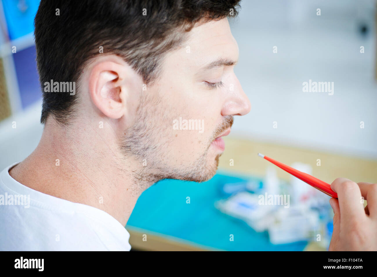 MAN WITH FEVER Stock Photo - Alamy