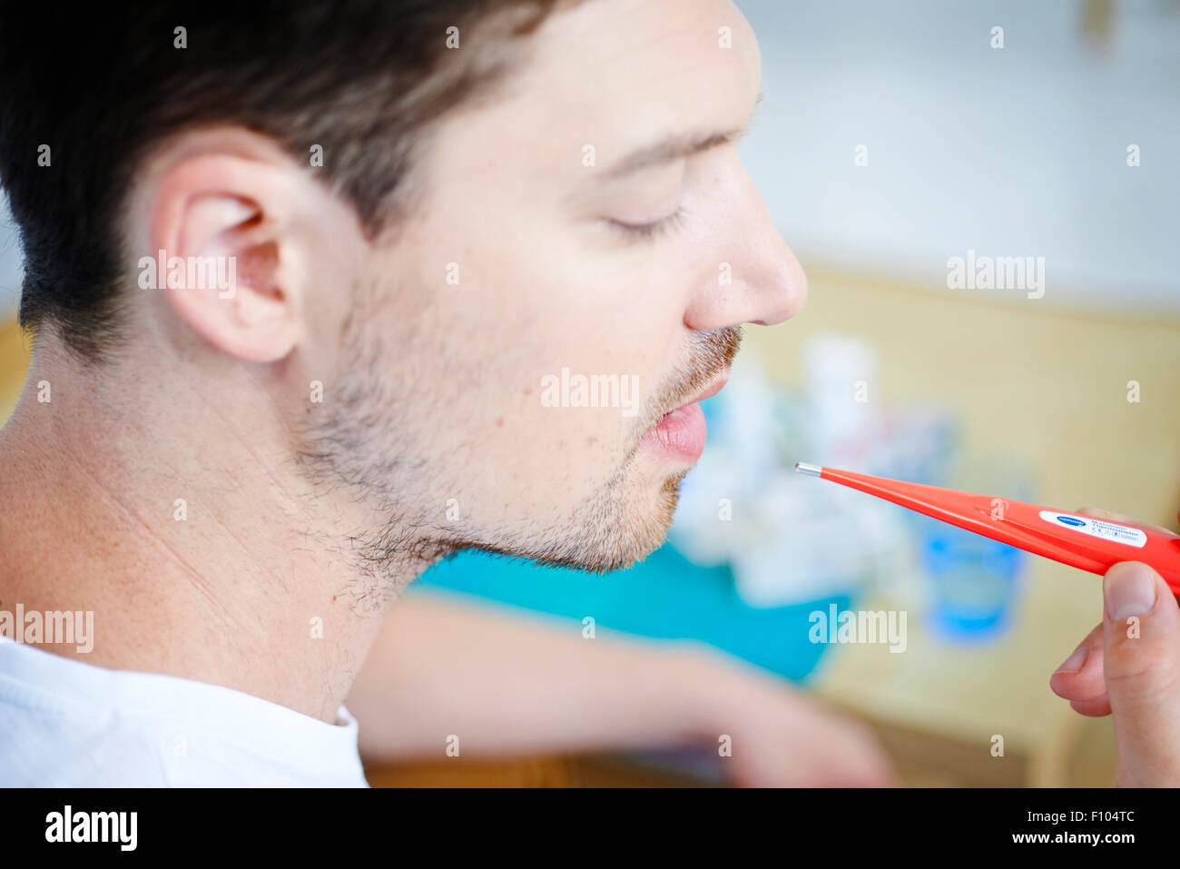 MAN WITH FEVER Stock Photo - Alamy