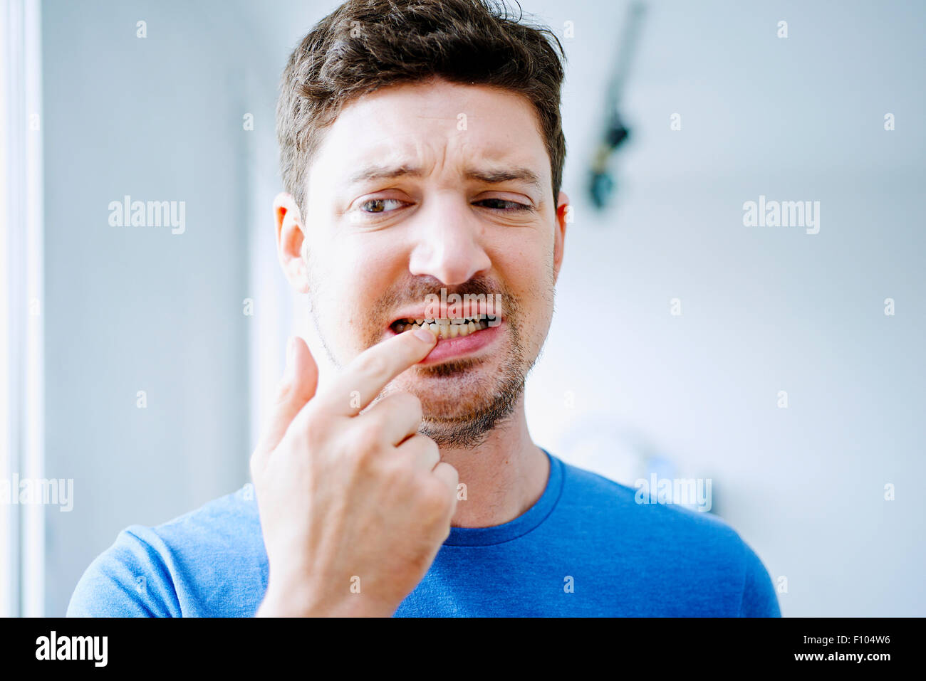 MAN WITH TOOTHACHE Stock Photo - Alamy