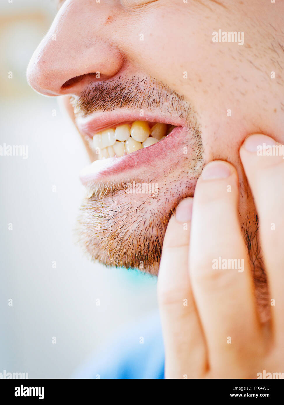 MAN WITH TOOTHACHE Stock Photo - Alamy