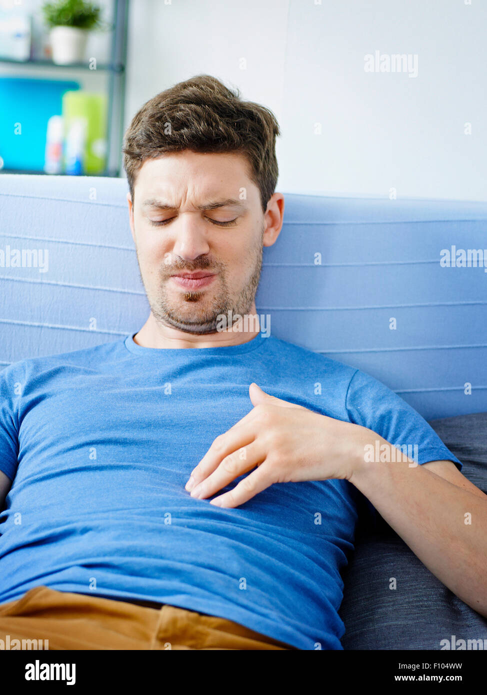 MAN WITH ABDOMINAL PAIN Stock Photo - Alamy