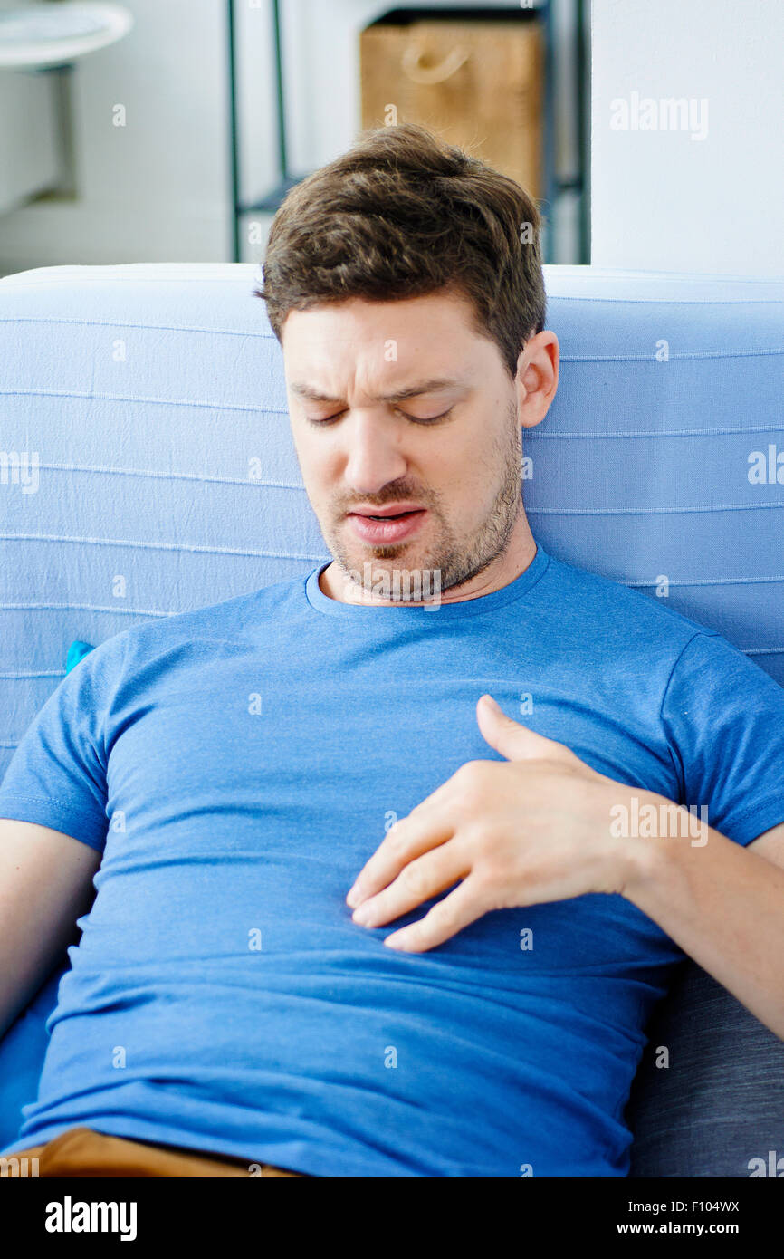 MAN WITH ABDOMINAL PAIN Stock Photo - Alamy