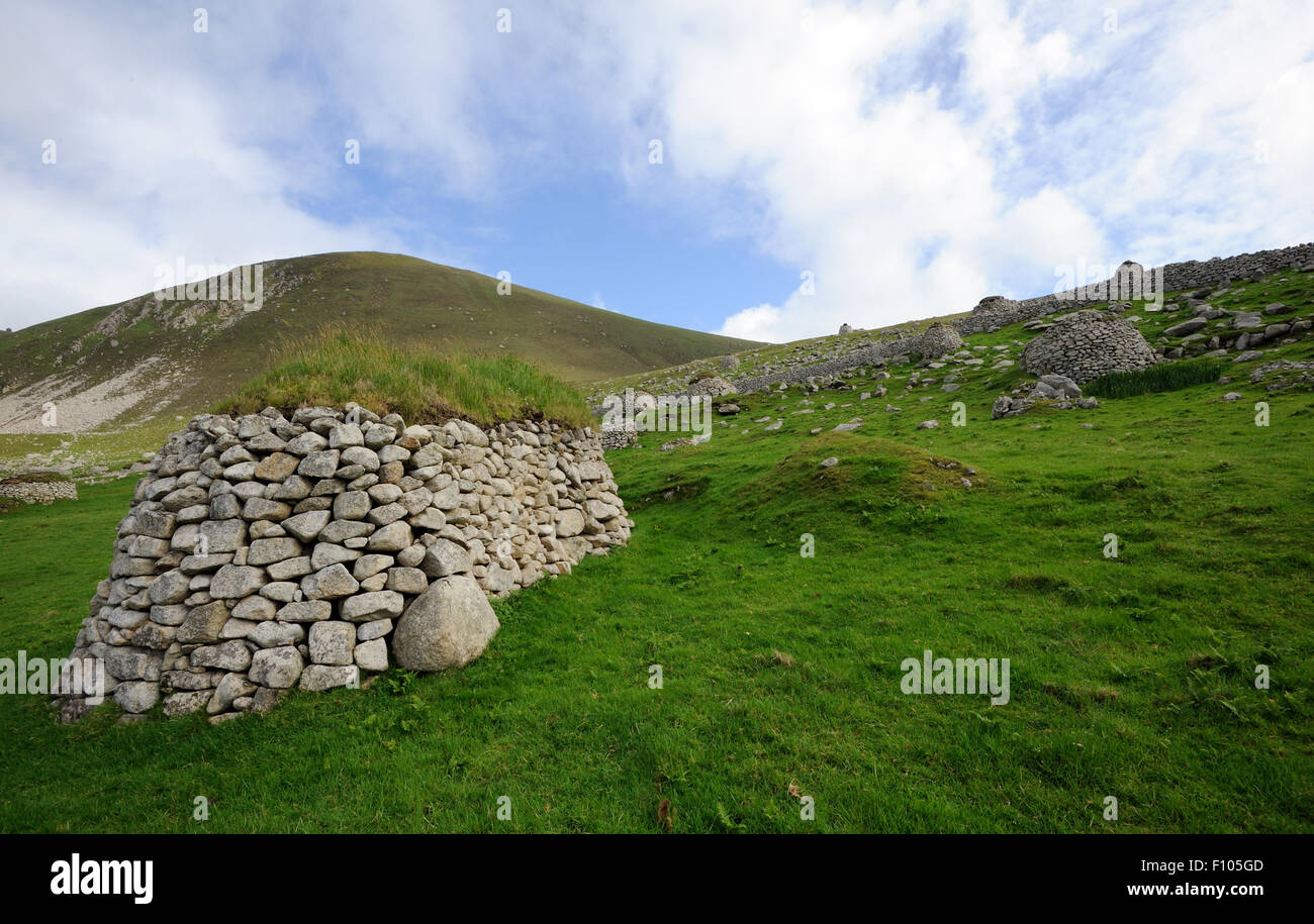 A cleit, a stone storage hut on Hirta, and a stone enclosure. Hirta, St ...