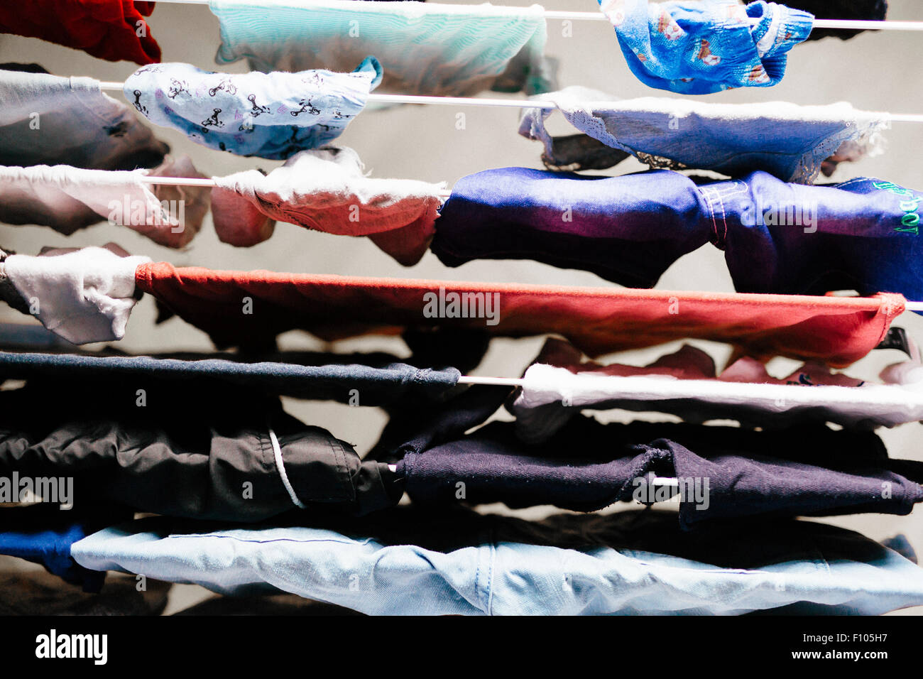 Colorful laundry hanged to dry Stock Photo - Alamy