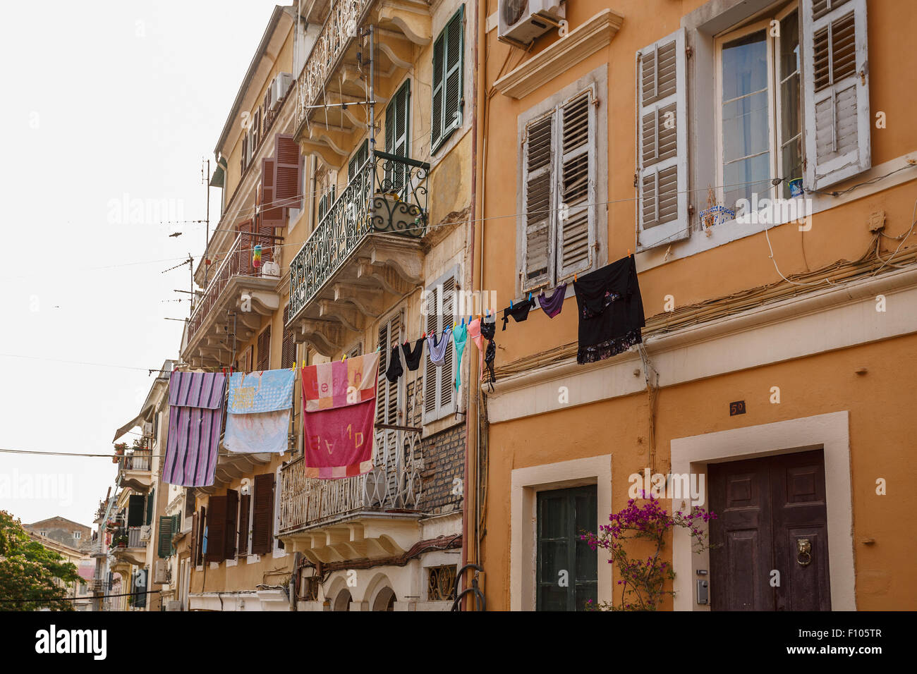 Clothes hanging for drying at the streets of Corfu town (Kerkyra) of ...