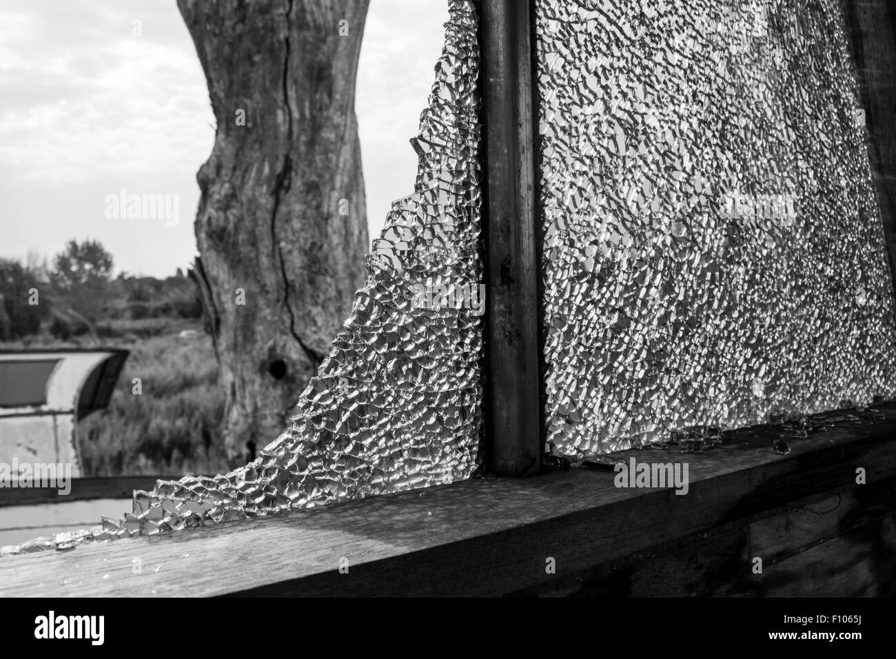 Broken glass shattered window Black and White Stock Photos & Images - Alamy