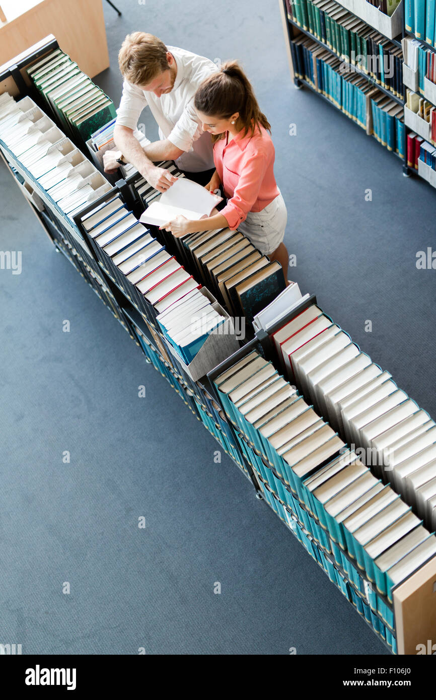 Young caucasian woman (student) with books Stock Photo - Alamy