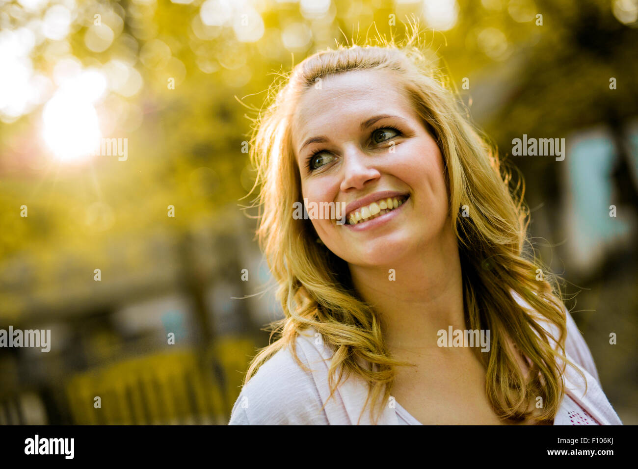 Beautiful young women smiling Stock Photo - Alamy