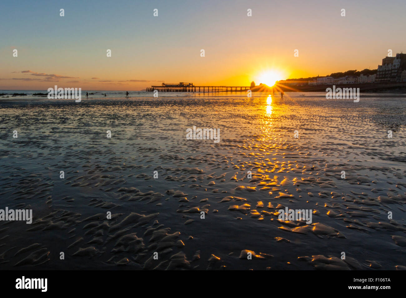 Silhouette hastings pier beach sunset hi-res stock photography and ...