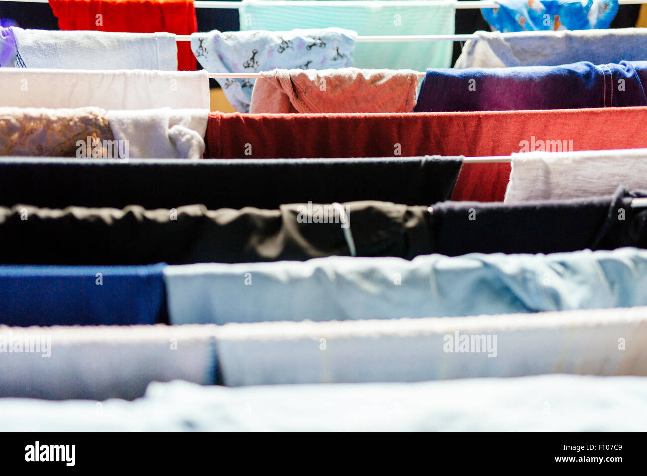 Colorful laundry hanged to dry Stock Photo - Alamy