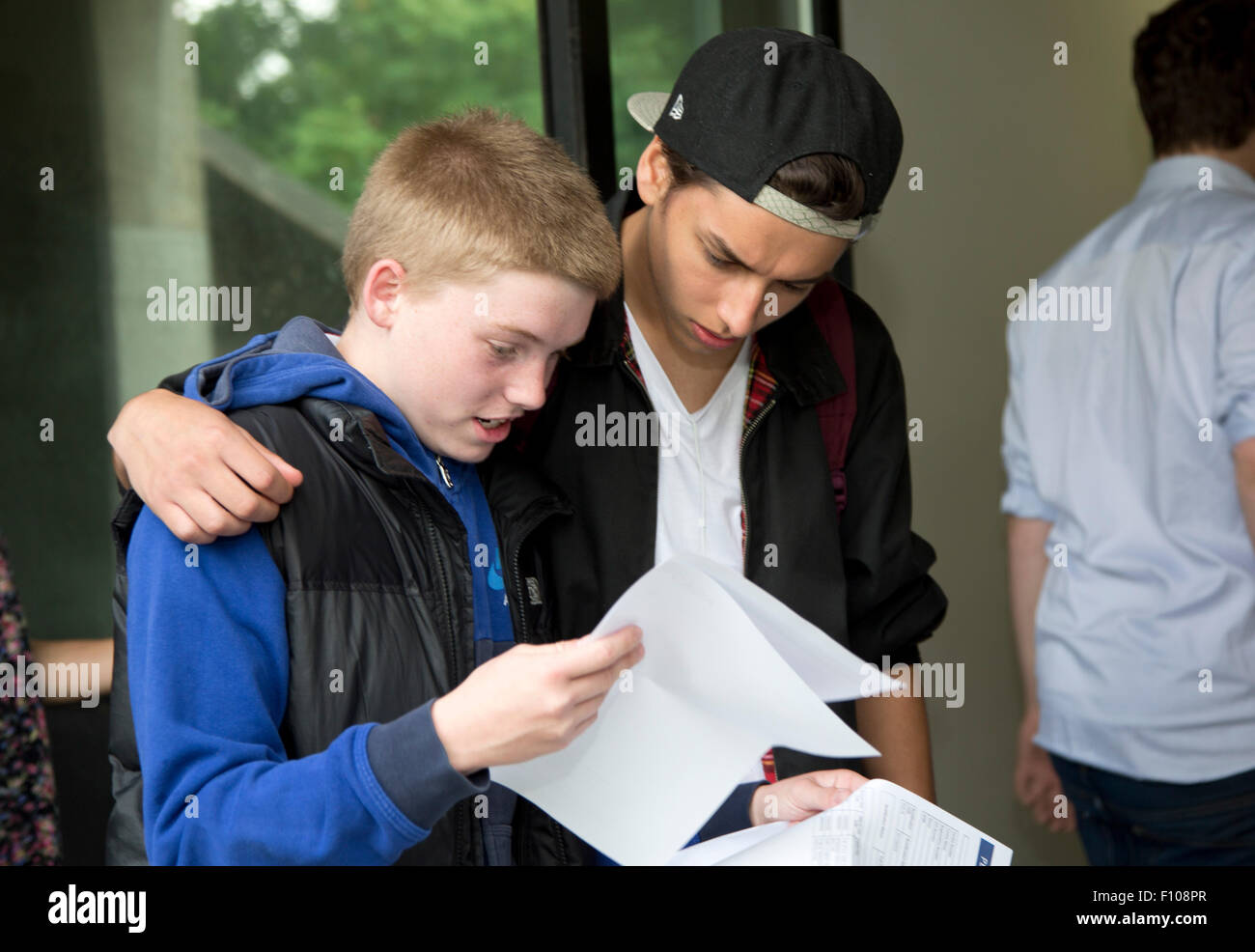 Students with their exam results Stock Photo - Alamy