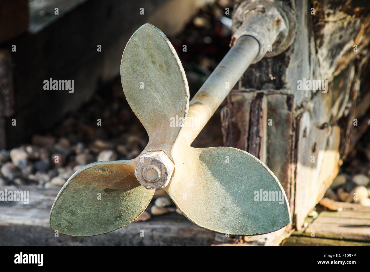 Old propeller on wooden boat located on land Stock Photo - Alamy