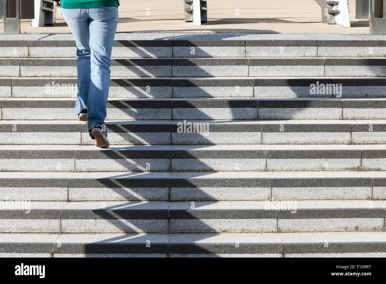 Person running up steps Stock Photo - Alamy