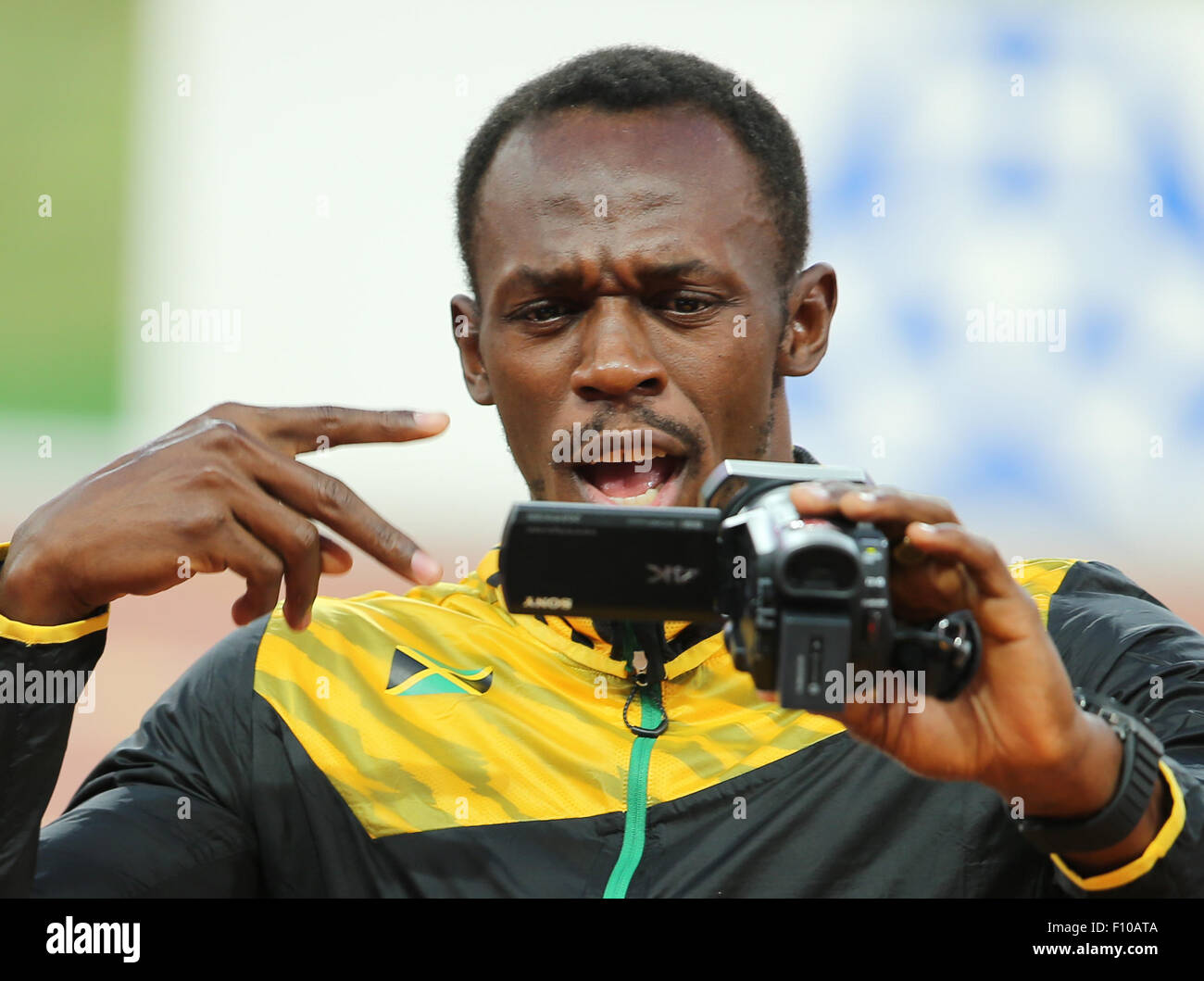 Beijing, China. 24th Aug, 2015. Jamaica's Usain Bolt takes a video ...