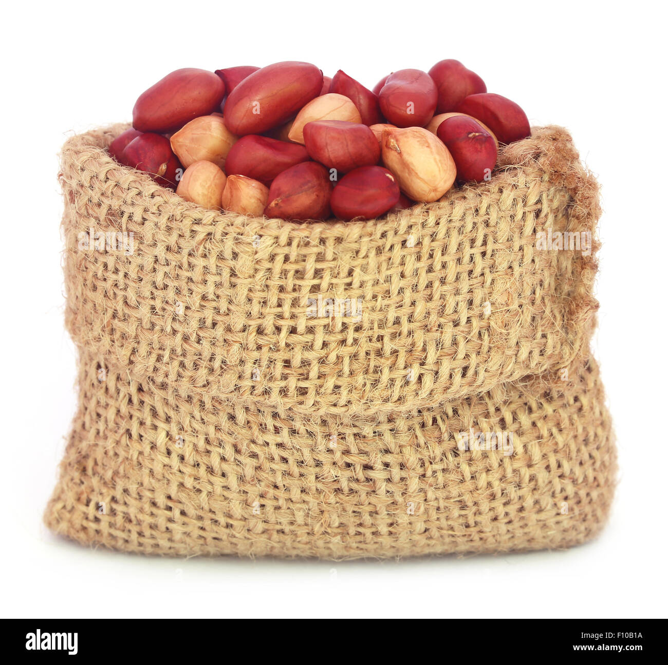 Fresh Peanuts in sack over white background Stock Photo - Alamy
