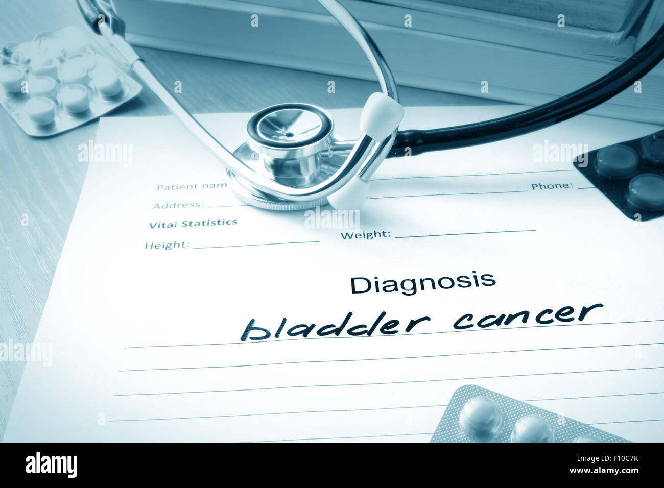 Diagnostic form with diagnosis bladder cancer and pills Stock Photo - Alamy