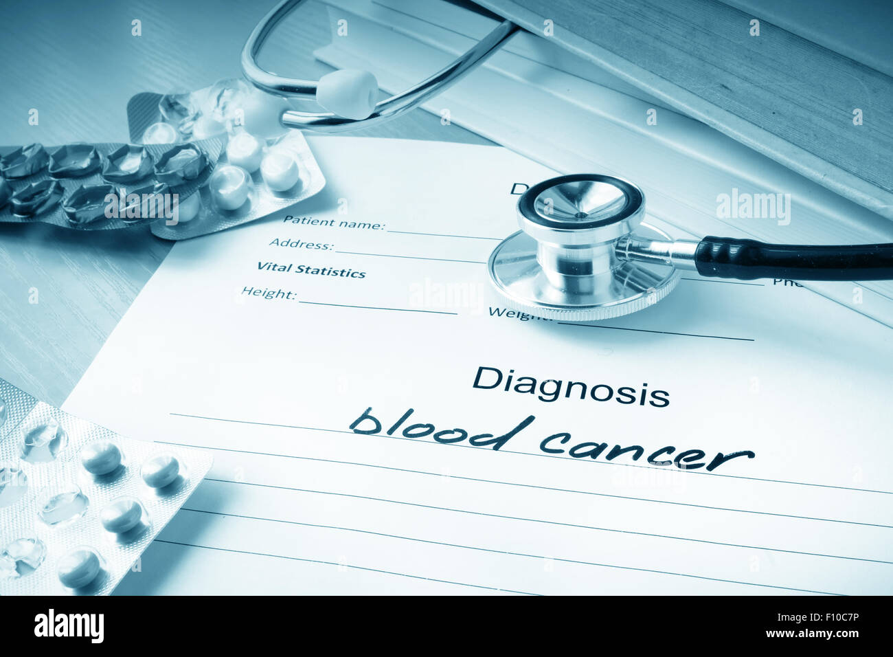 Diagnostic form with diagnosis blood cancer and pills Stock Photo - Alamy