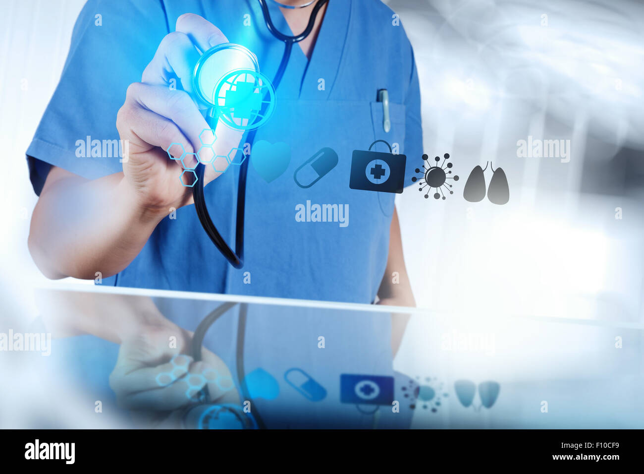 Medicine doctor hand working with modern computer interface as medical ...