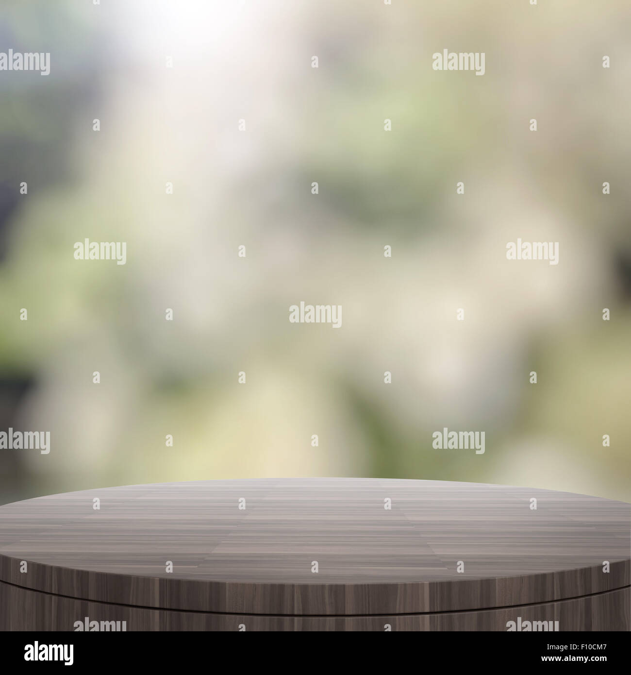 Empty wooden round table and blurred background for product ...