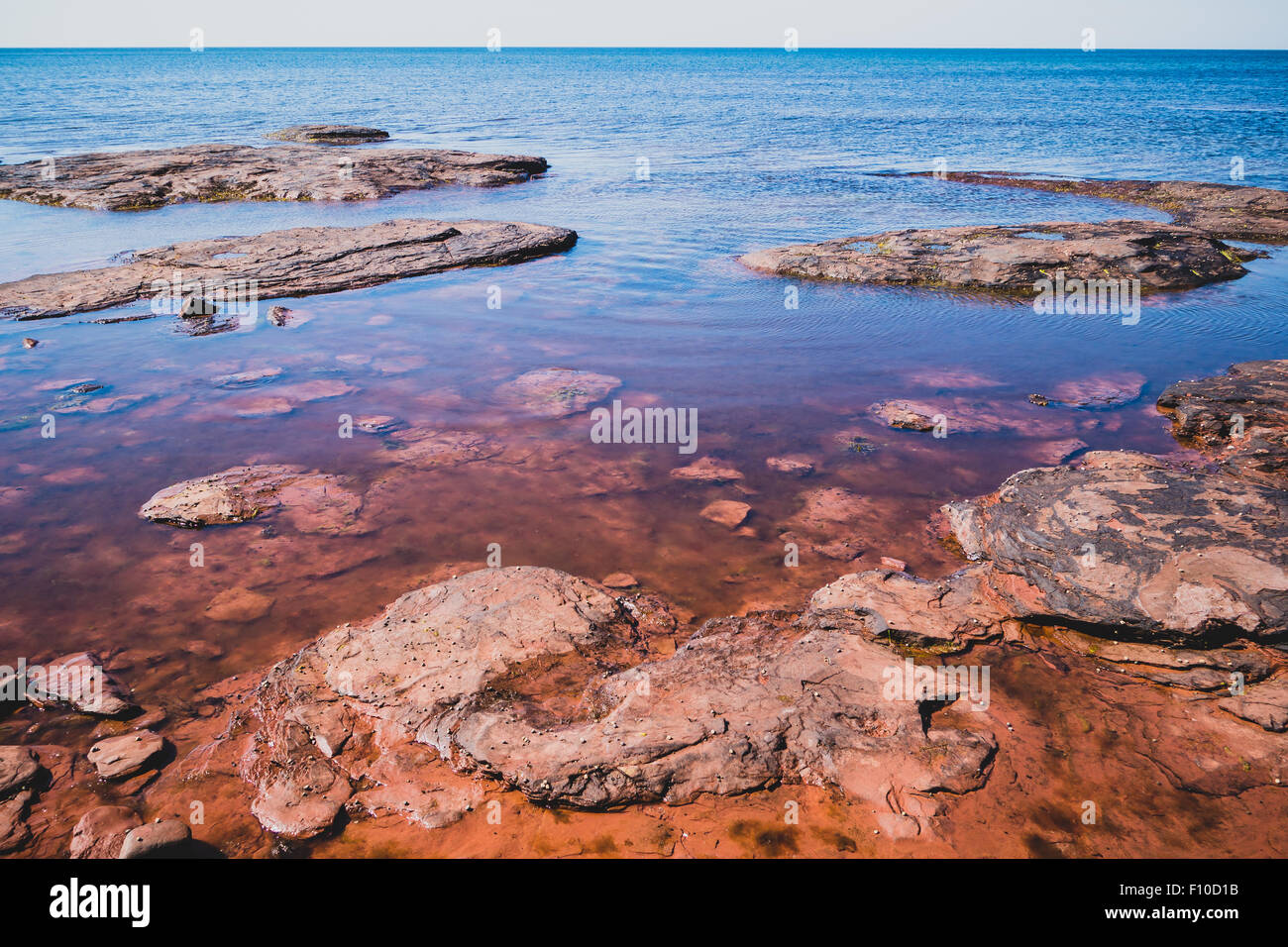 red rock ocean water sea Stock Photo - Alamy