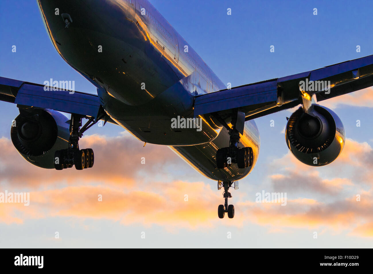 A Cathay Pacific Boeing 777-300 ER lands on London Heathrow's Runway 27 ...