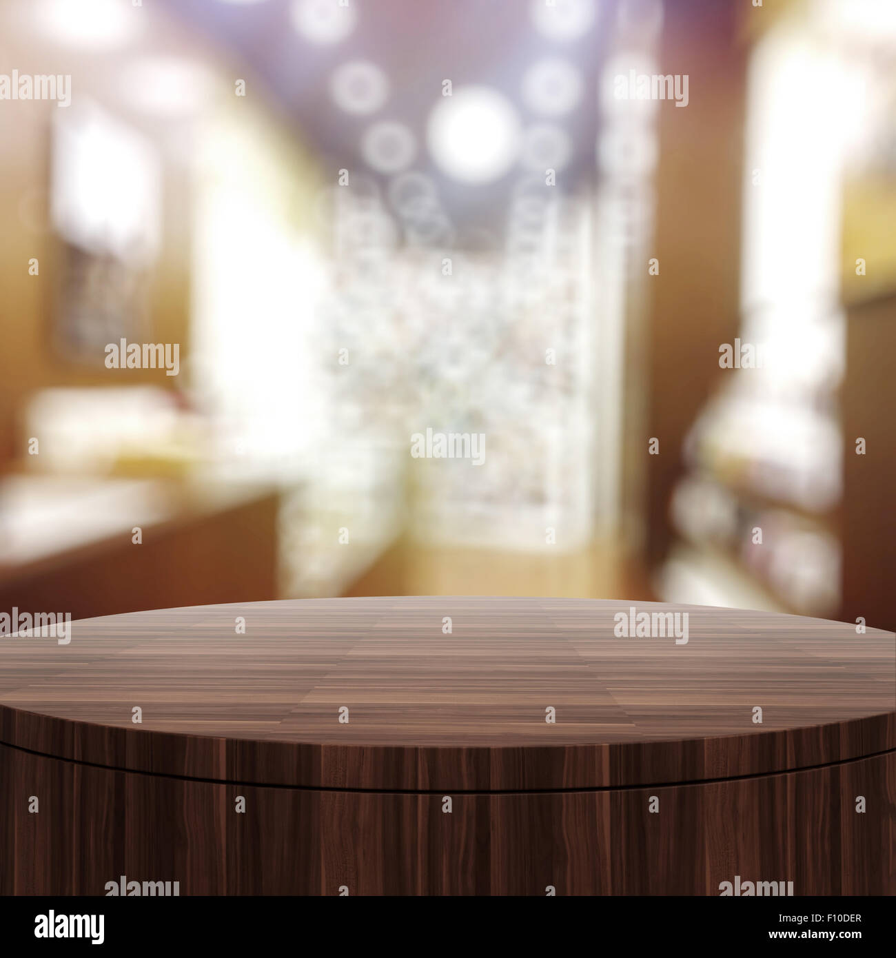 Empty wooden round table and blurred background for product ...