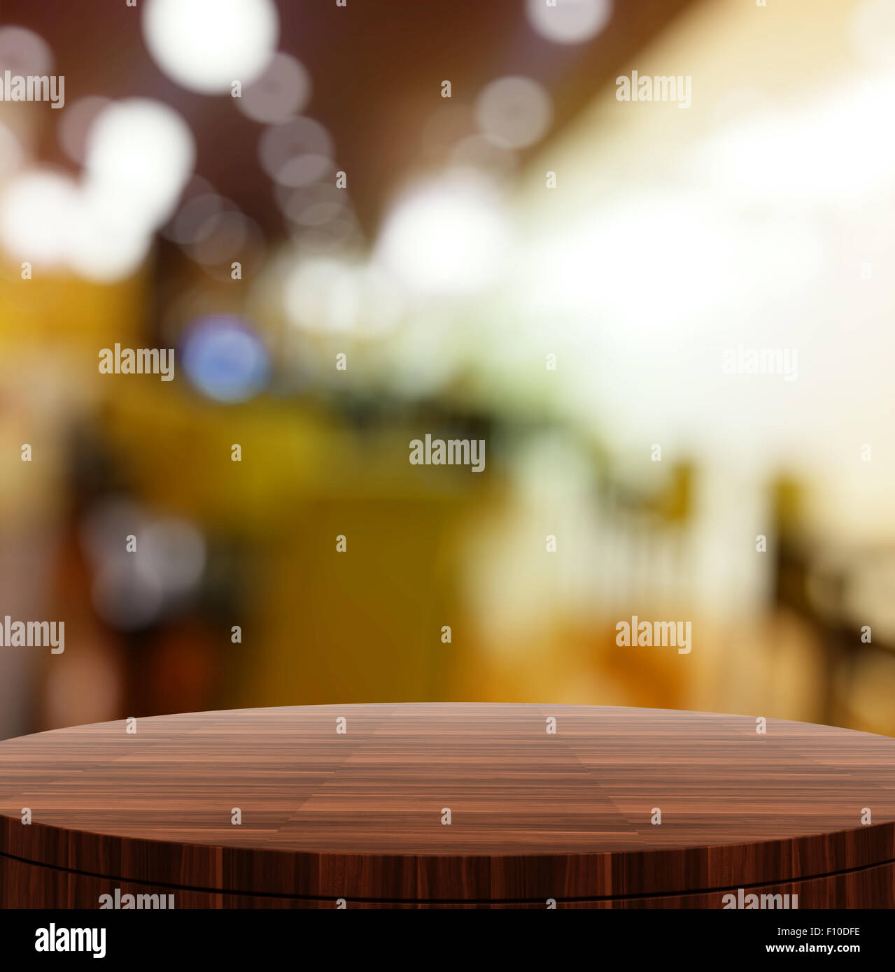 Empty wooden round table and blurred background for product ...