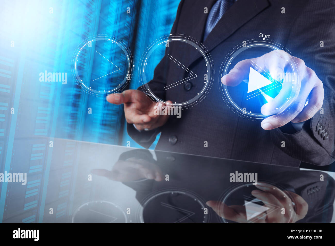 businessman hand press play button sign to start or initiate projects ...