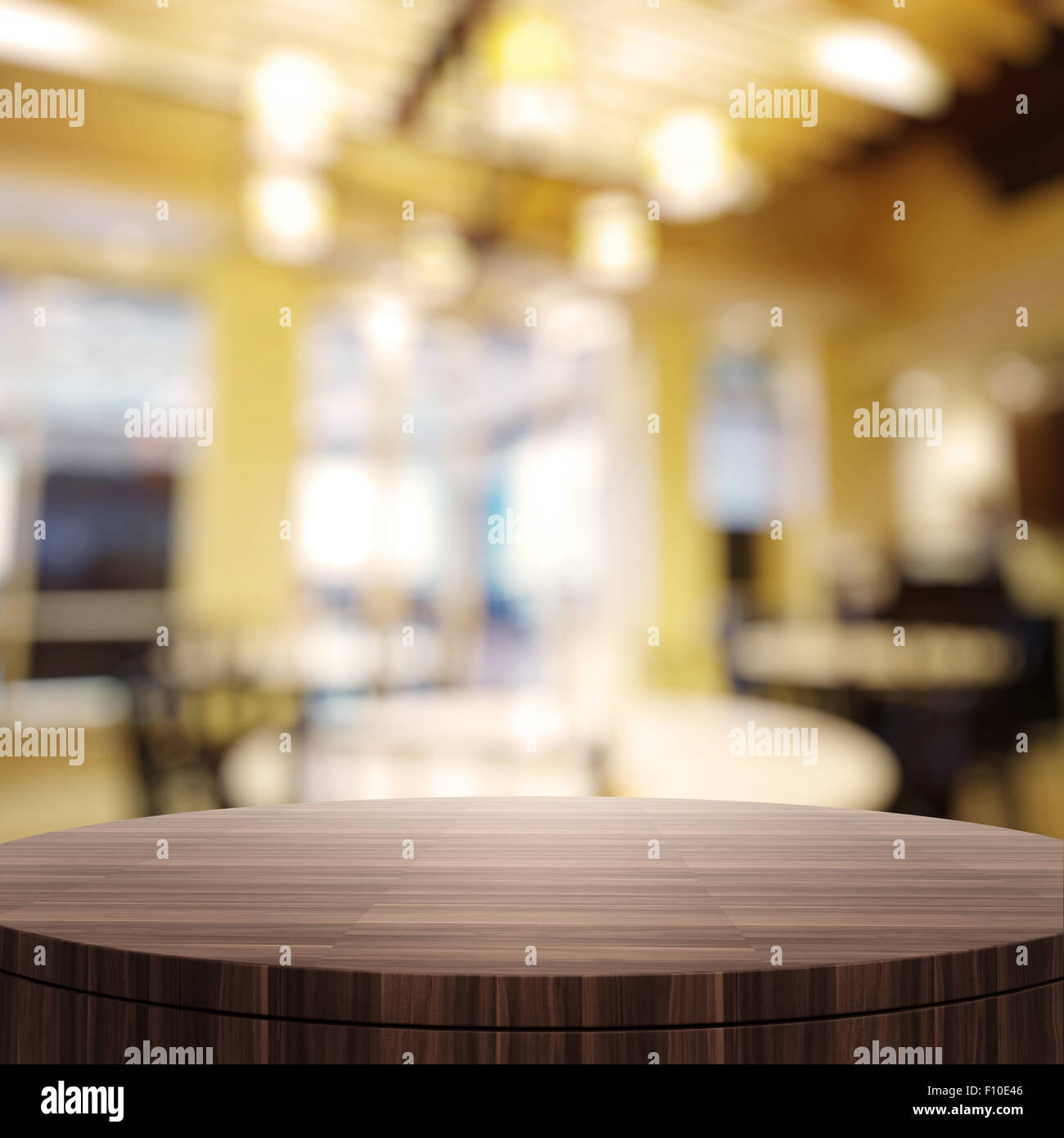 Empty wooden round table and blurred background for product ...