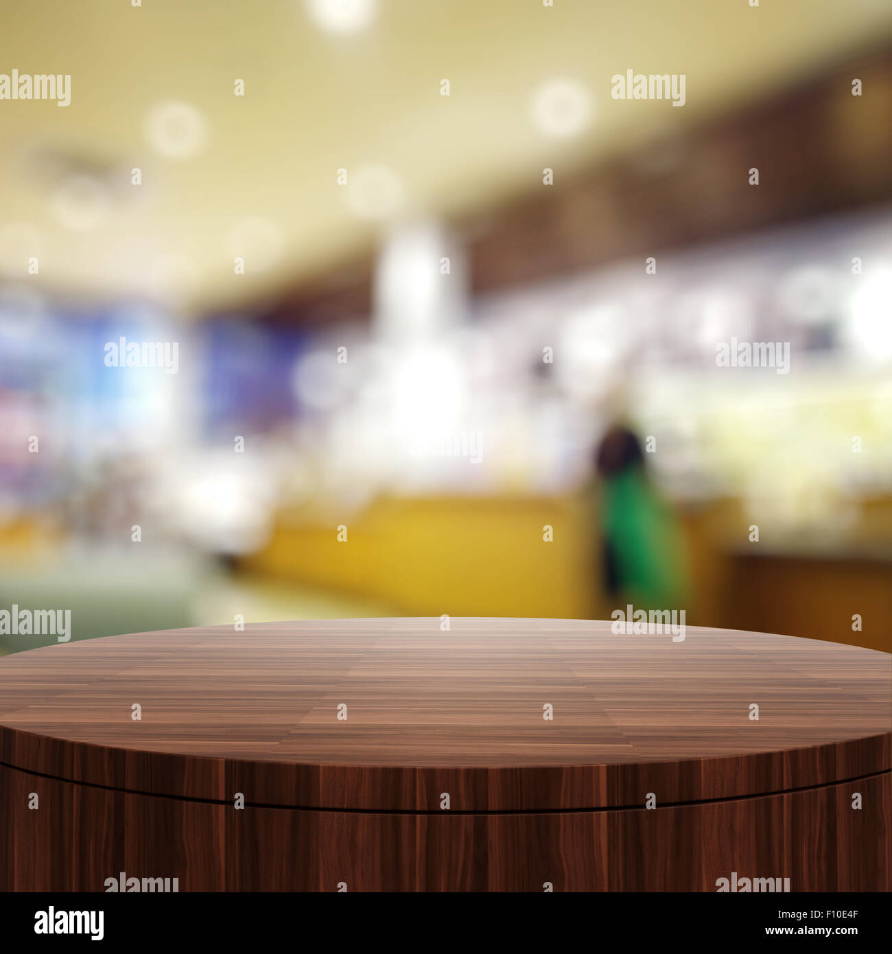 Empty wooden round table and blurred background for product ...