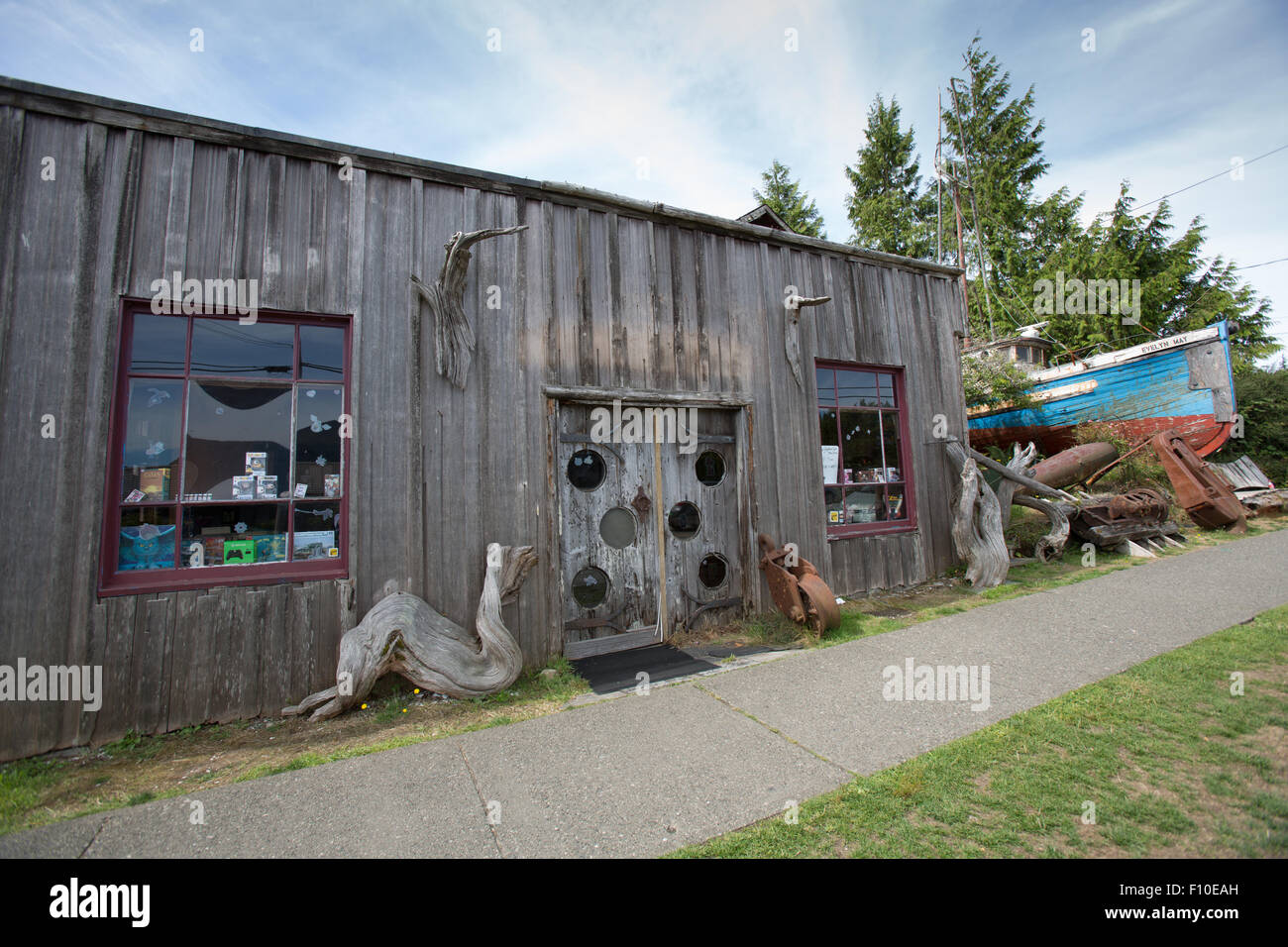 Eccentric timber built shop, built around a rock, in Ucluelet ...