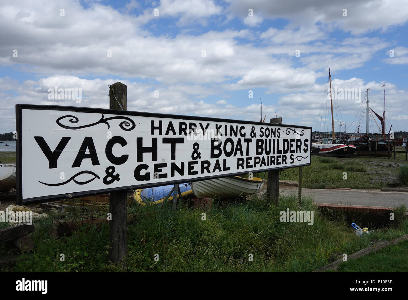 Harry King boatyard Pin Mill on river Orwell hand lettered sign Stock ...
