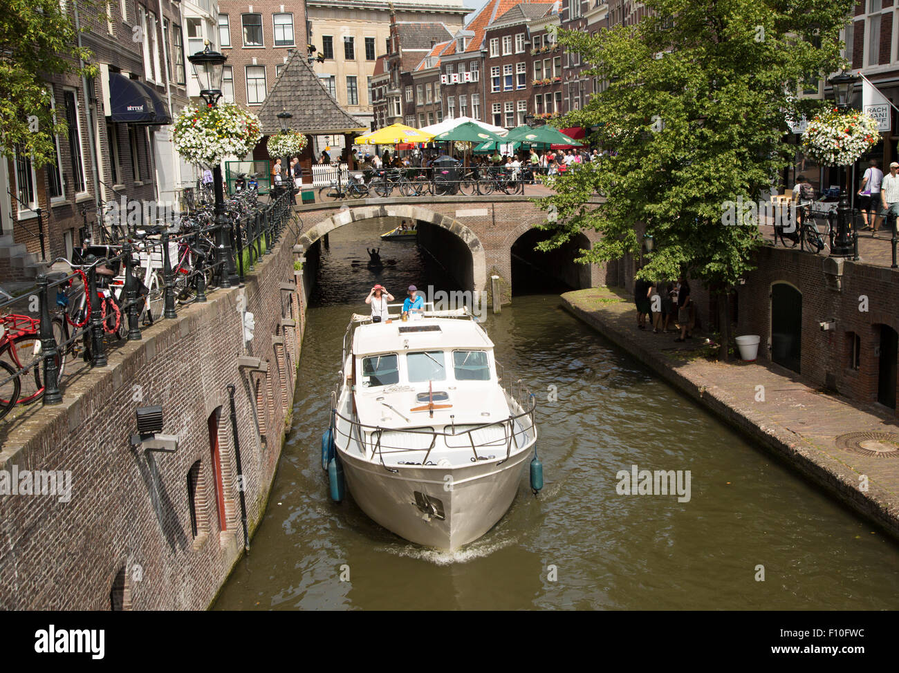 Pleasure boat on Oudegracht canal in central Utrecht, Netherlands Stock ...