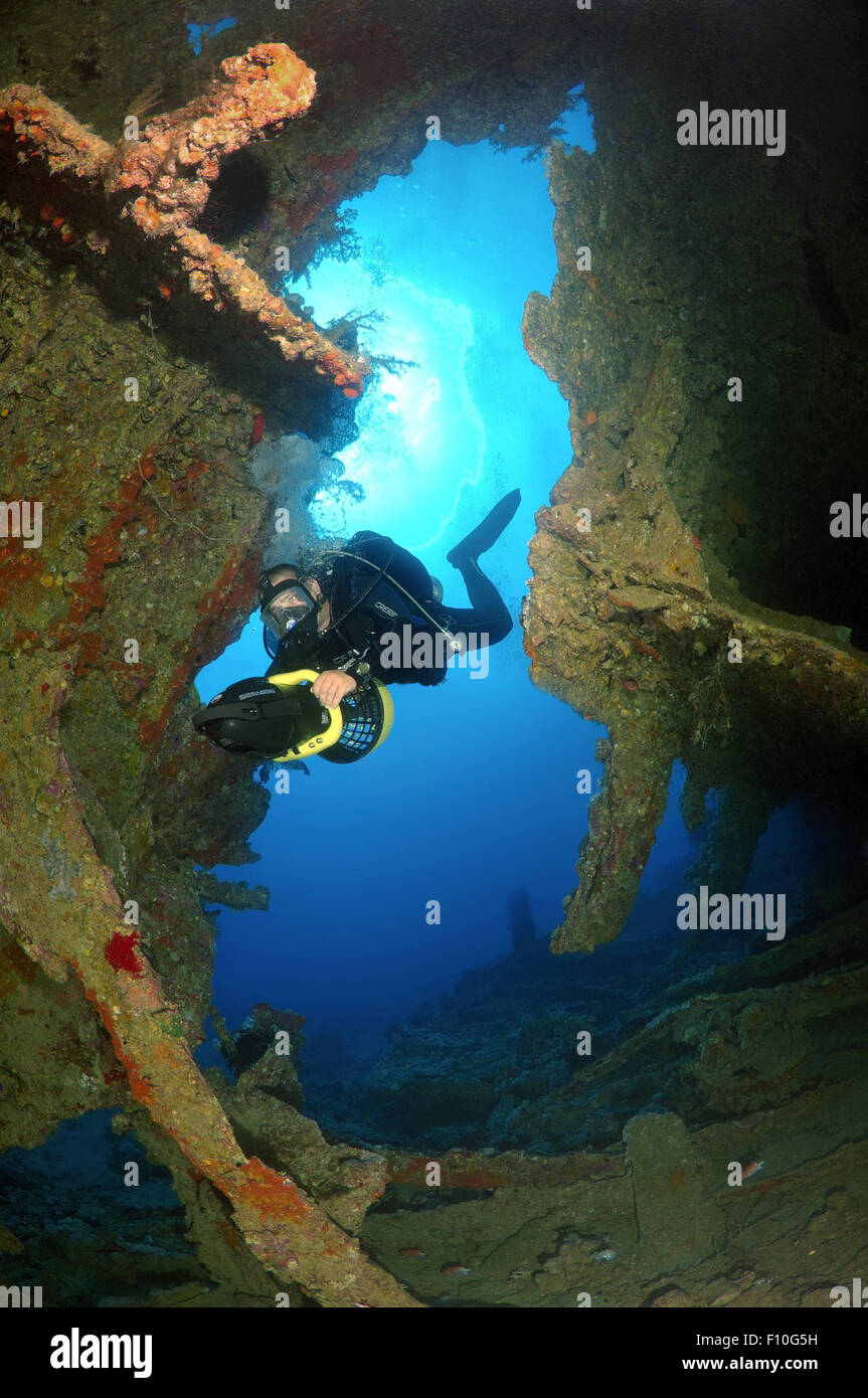 Red Sea, Egypt. 15th Oct, 2014. Diver on underwater scooter swims in ...